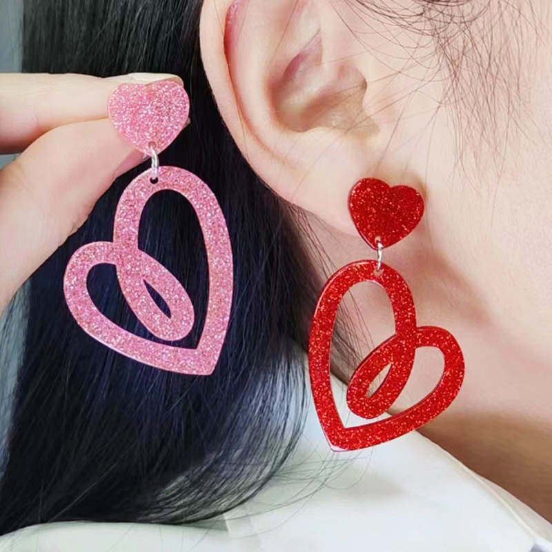 Big pink heart earrings store